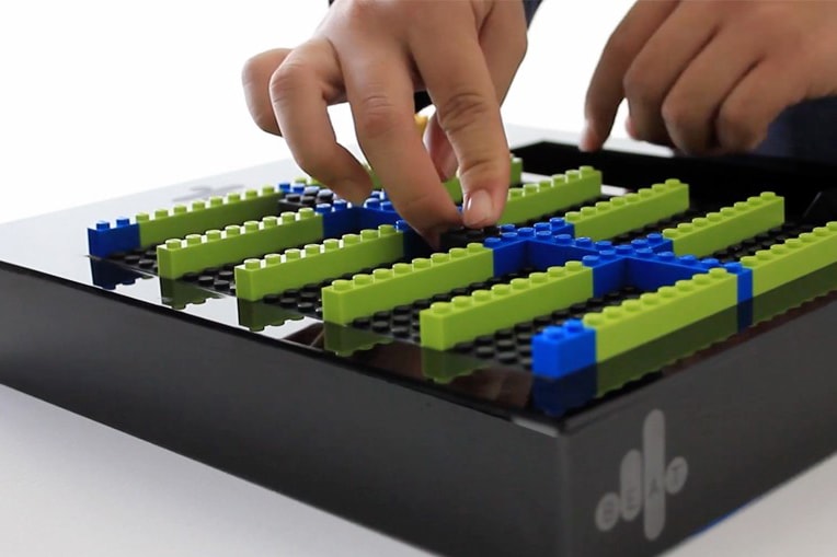 lego music by esteban cardona uses plastic toy bricks to construct a ...