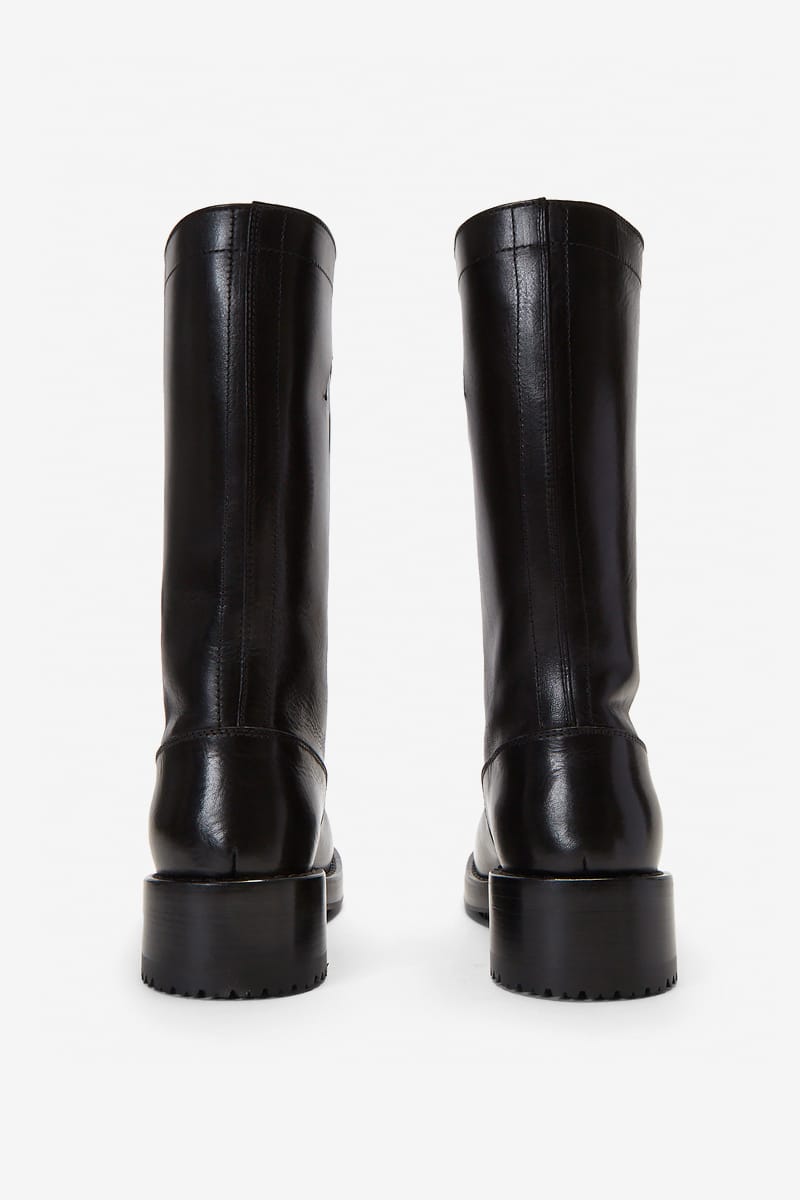 Raf Simons Cut-Out Smiley Face Leather Boots | Hypebeast Raf Simons Cut-Out Smiley Face Leather Boots | Hypebeast