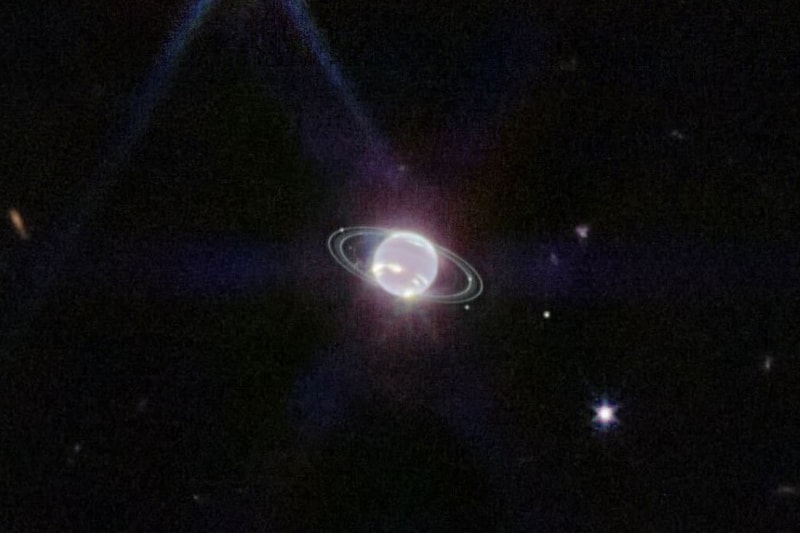 NASA Releases Photos of Neptune's Rings & Moons | Hypebae
