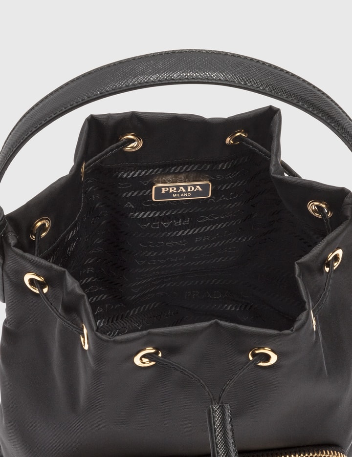 Prada - Duet Re-nylon Bucket Bag | HBX - Globally Curated Fashion and Lifestyle by Hypebeast