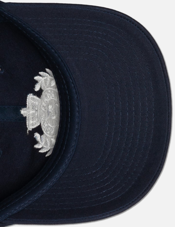 Sporty & Rich NY Crest Hat - 纯棉六片式棒球帽，饰有徽章刺绣与可调节帽围。 | HBX