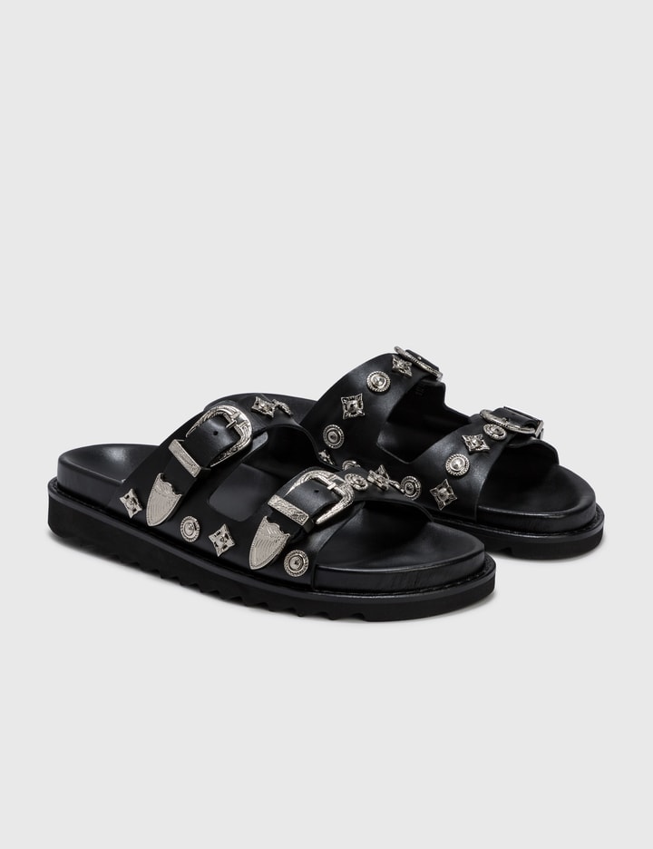 Toga Virilis - Studded Leather Slides | HBX - HYPEBEAST 為您搜羅全球潮流時尚品牌