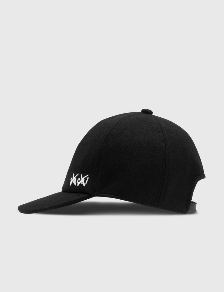Sacai - KAWS Melton Cap | HBX - Globally Curated Fashion and Lifestyle ...