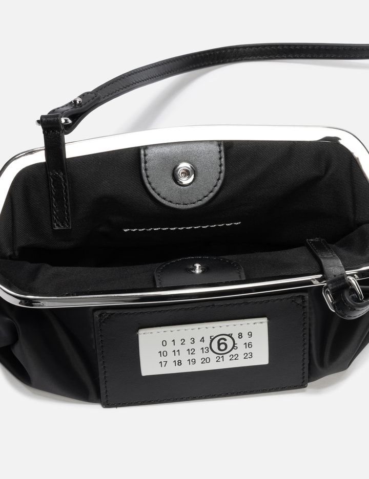 MM6 Maison Margiela Reverse Pochette Mini - Black mini frame bag with ...