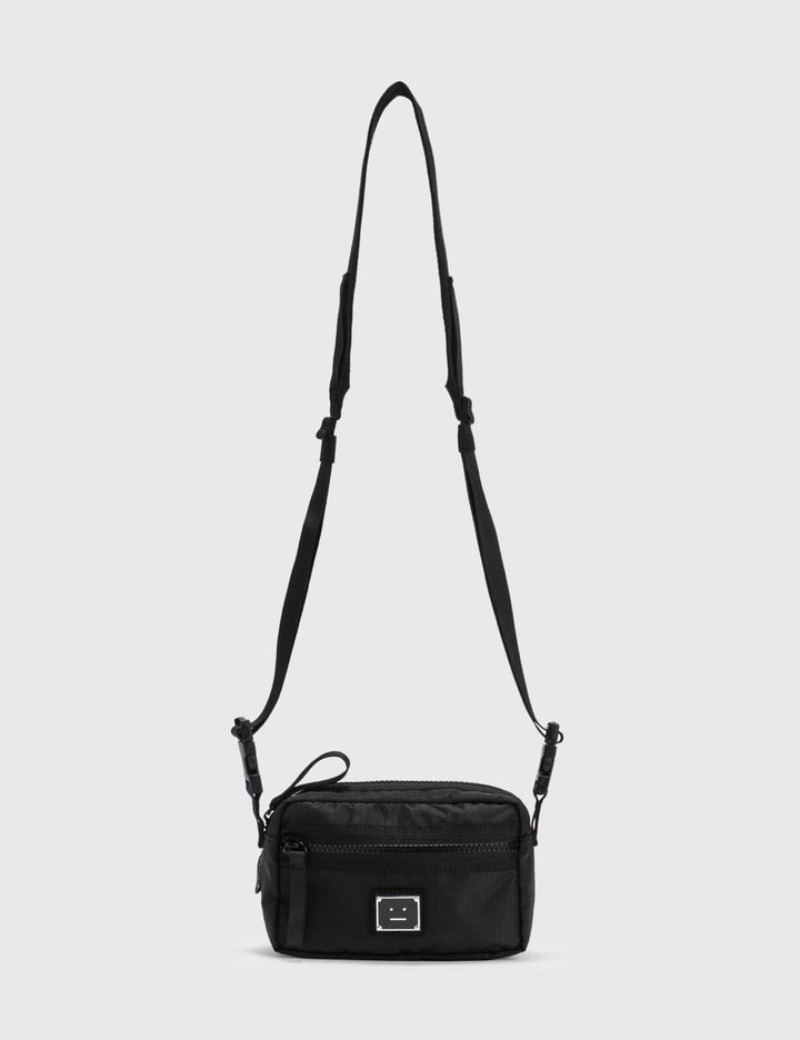 Acne Studios - Crossbody Face Bag | HBX - Globally Curated Fashion and ...