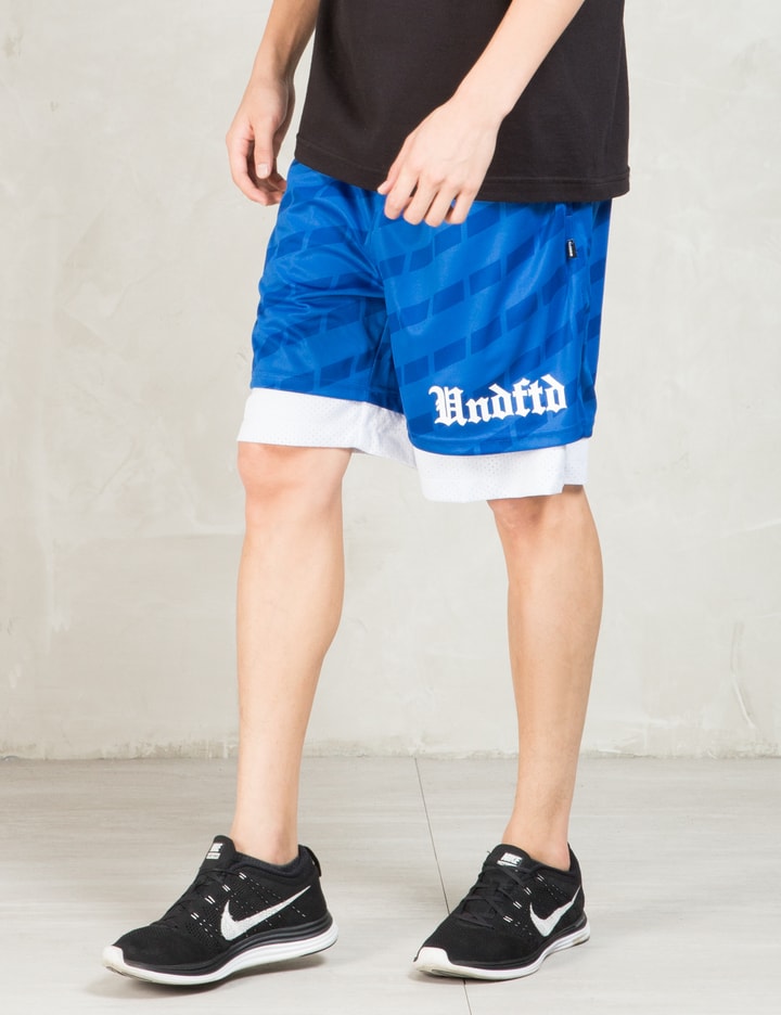 Undefeated - Blue Hooligan Reversible Shorts | HBX - HYPEBEAST 為您搜羅全球潮流時尚品牌