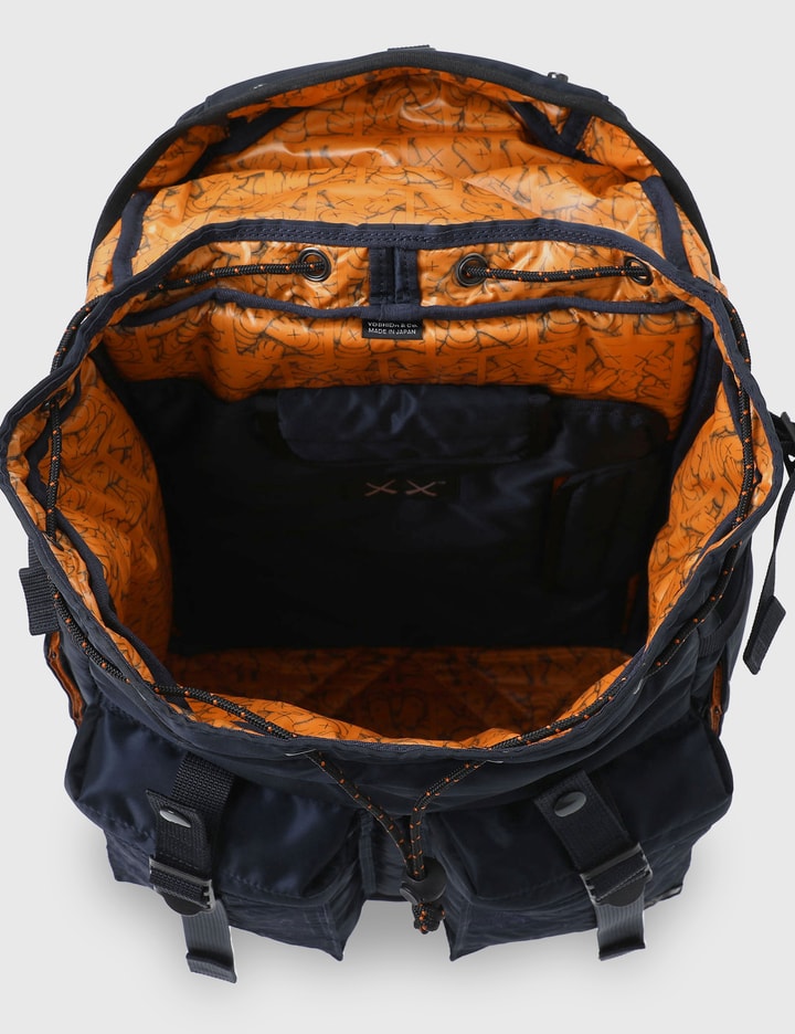 PORTER - PORTER × Kaws BACKPACK | HBX - Globally Curated Fashion and ...