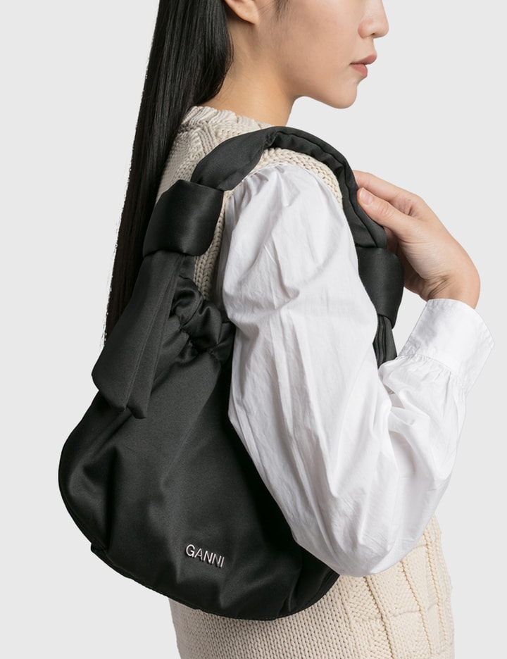 Ganni - Ganni Knotted Hobo Bag | HBX - Globally Curated Fashion and ...