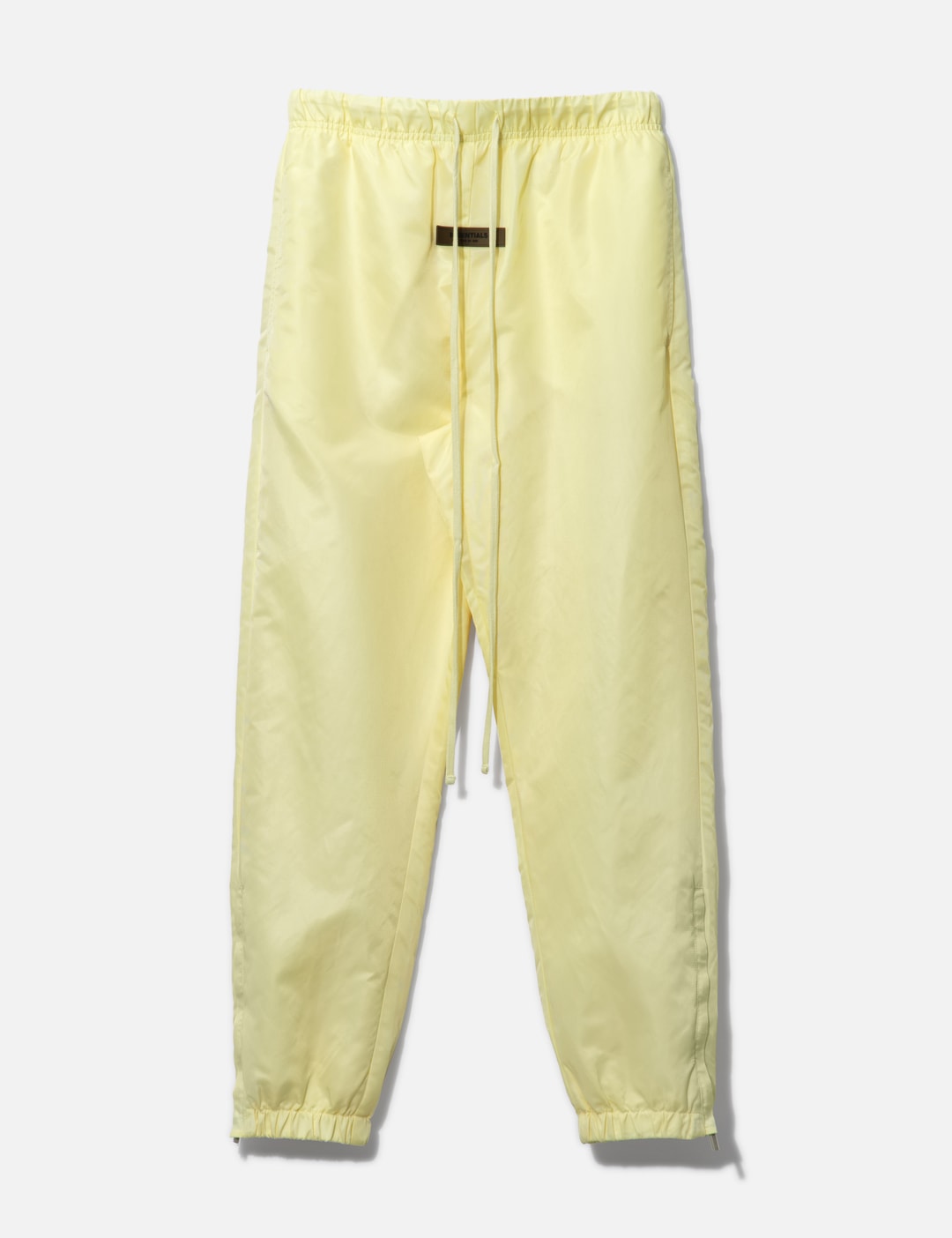 Fear of God Essentials - FEAR OF GOD ESSENTIAL NYLON TRACKPANTS | HBX