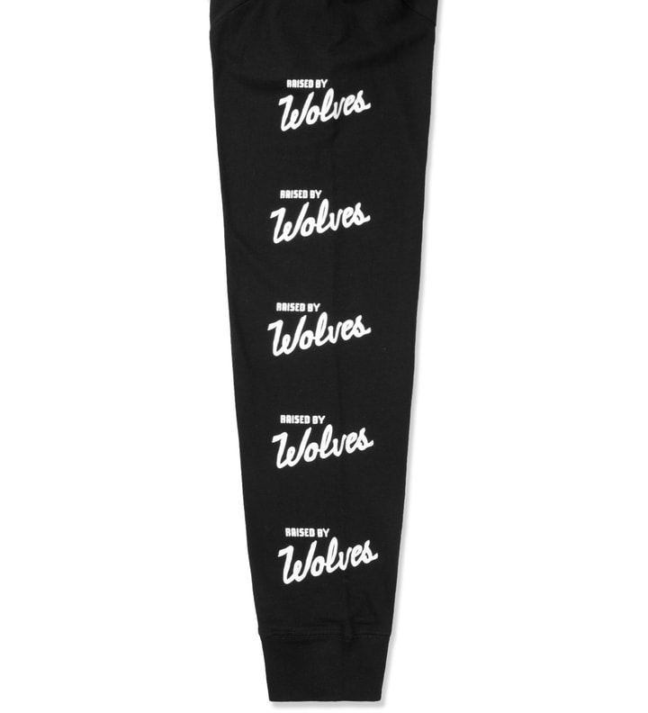 Raised By Wolves - Black Varsity Logo L/S T-Shirt | HBX - Globally ...