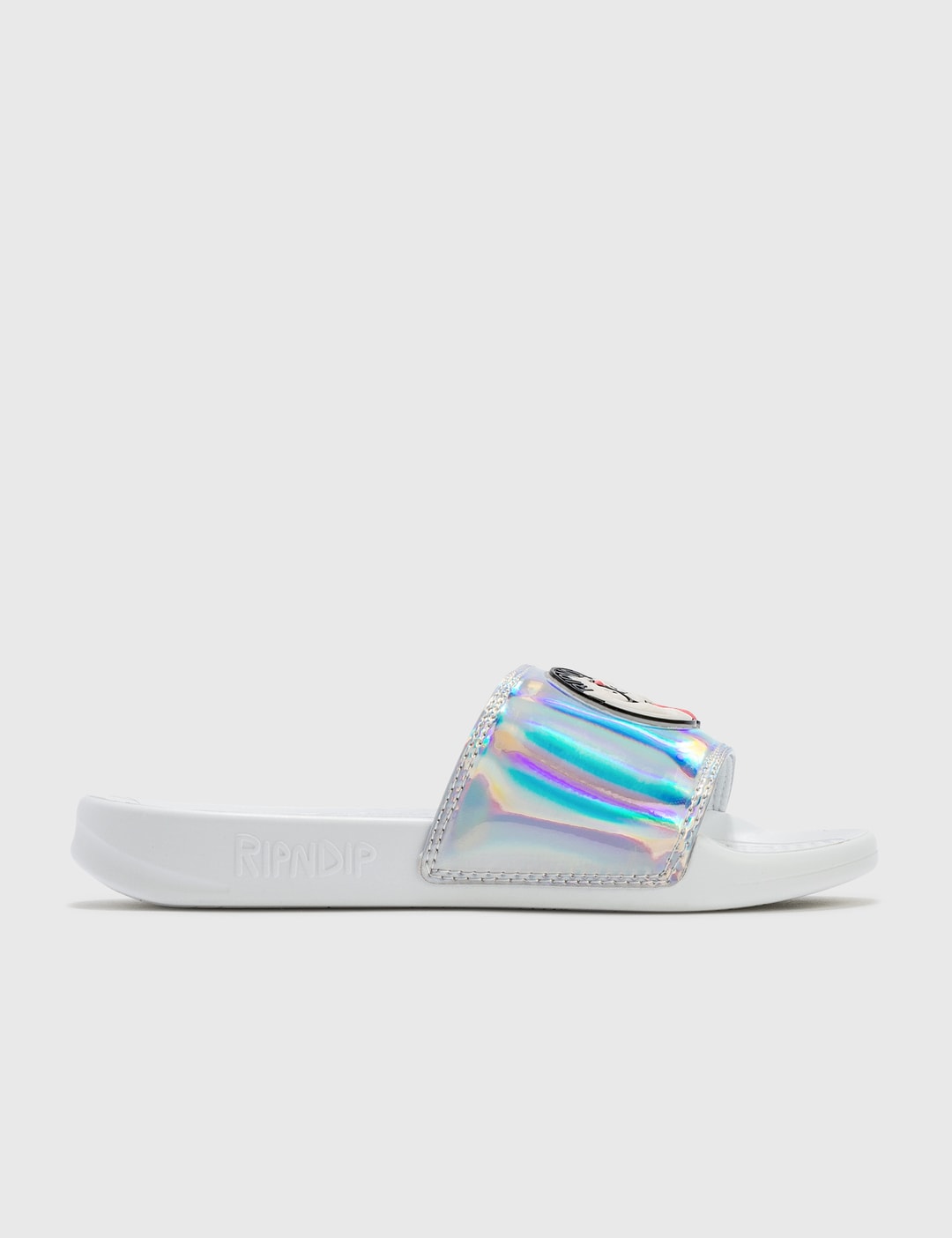 RIPNDIP - Pill Iridescent Slides | HBX - Globally Curated Fashion and ...