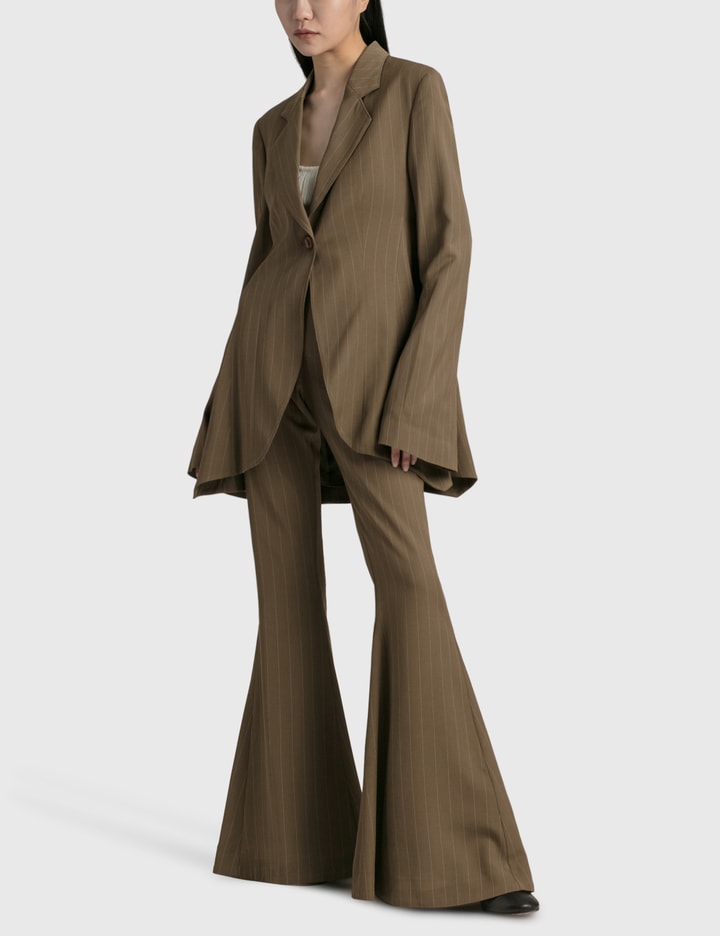 Acne Studios - Flared Striped Trousers | HBX - Globally Curated Fashion and Lifestyle by Hypebeast