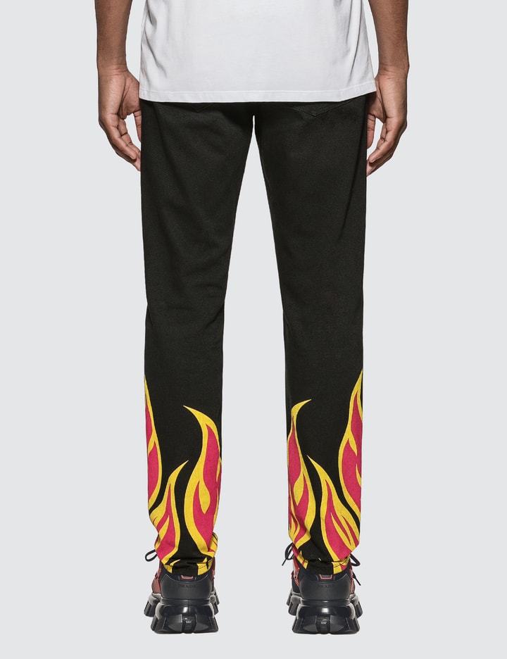 MSGM - Flame Printed Jeans | HBX - Globally Curated Fashion and ...