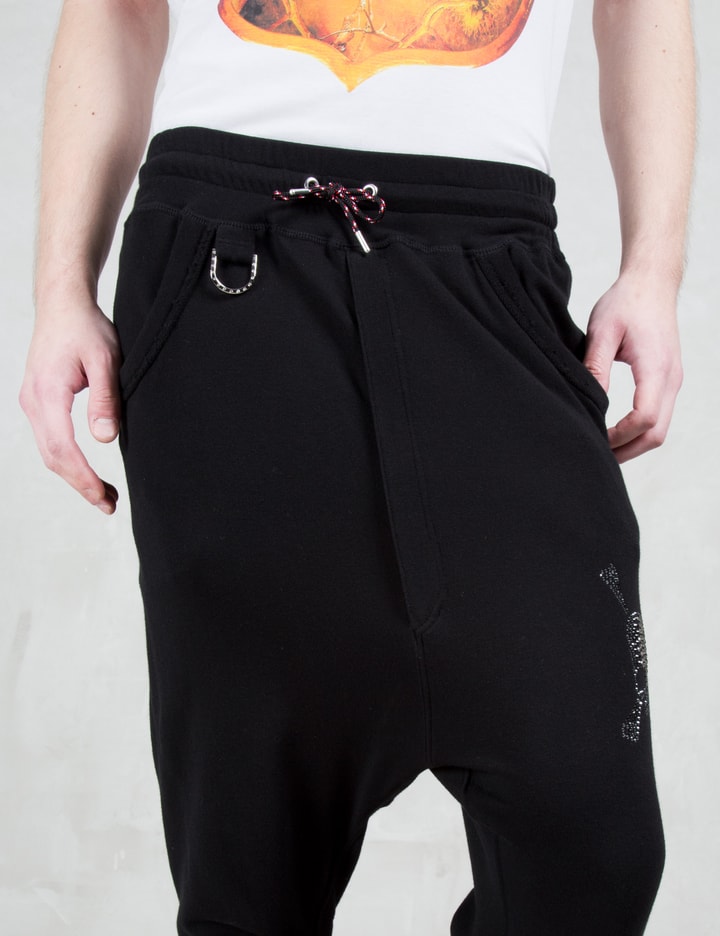 Roen - Crystal Skull Sweat Pants | HBX - HYPEBEAST 為您搜羅全球潮流時尚品牌