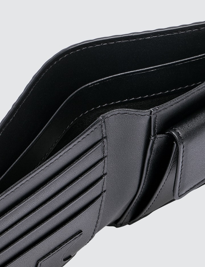 MCM - Claus Bi-Fold Coin Wallet | HBX - HYPEBEAST 為您搜羅全球潮流時尚品牌