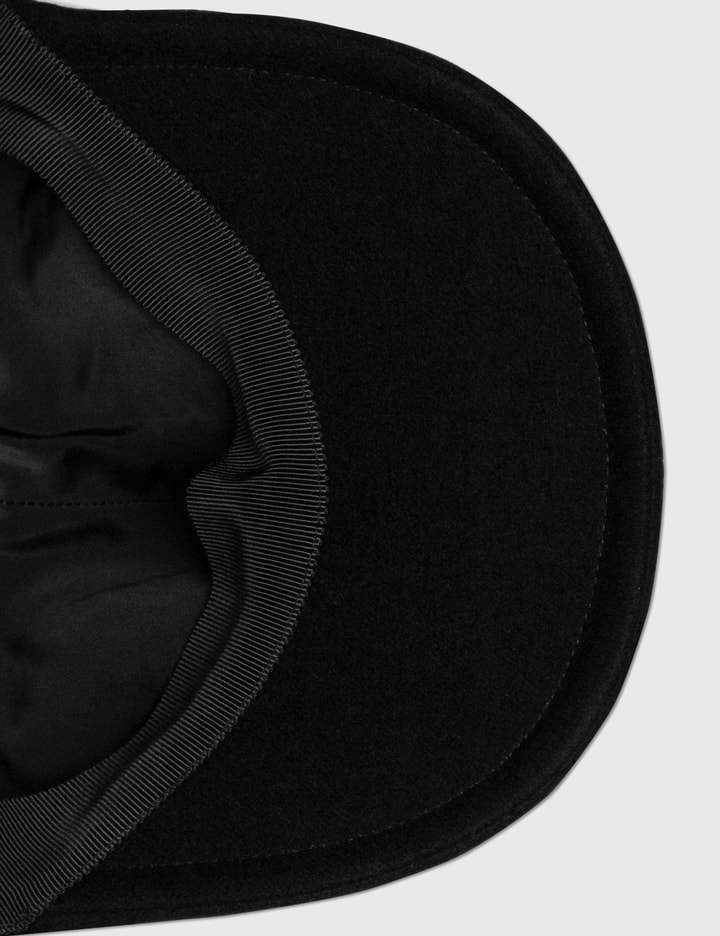 Sacai - KAWS Melton Cap | HBX